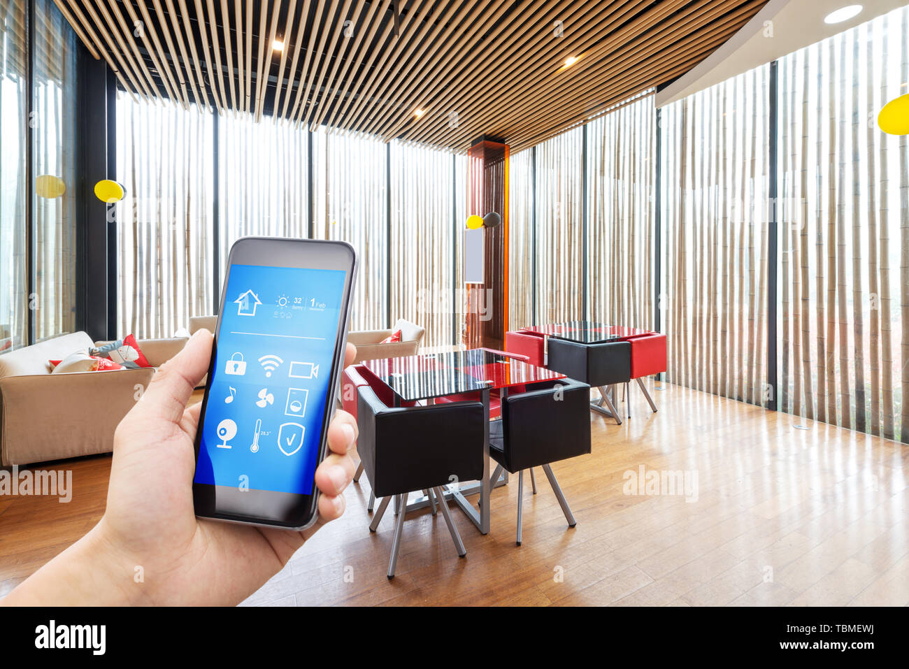 smart phone with smart home with modern lobby Stock Photo - Alamy