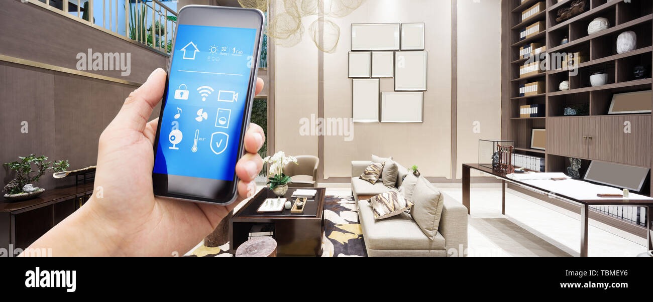 smart phone with smart home with modern living room Stock Photo - Alamy