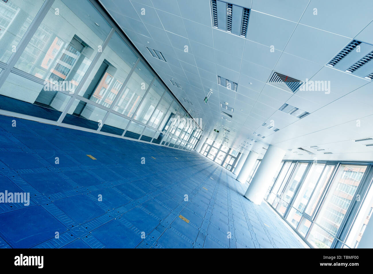 Windows in indoor glass room inside with buildings hi-res stock ...