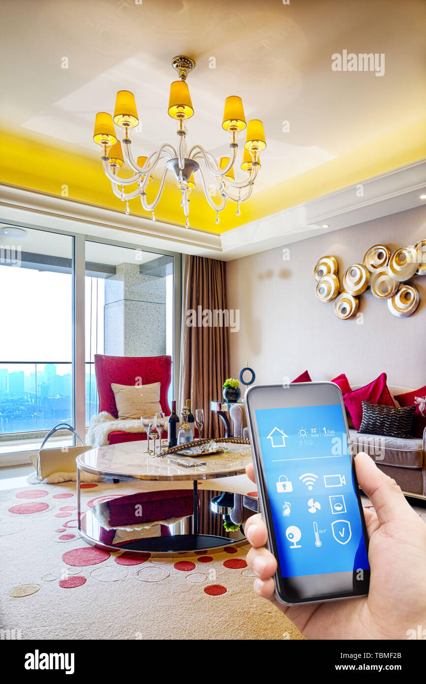 smart phone with smart home with modern living room Stock Photo - Alamy