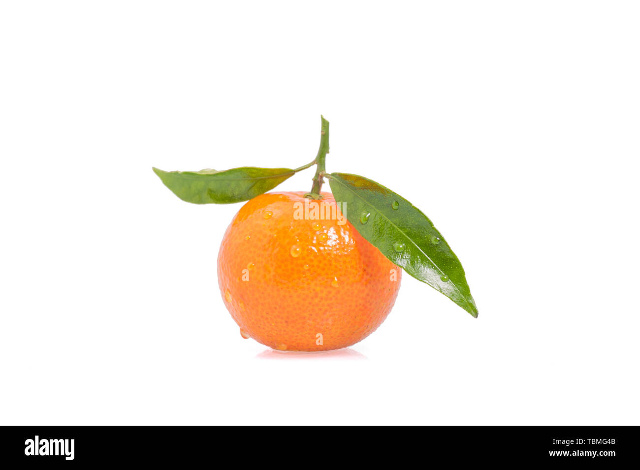 Mandarin with green leaf isolated on white background Stock Photo - Alamy