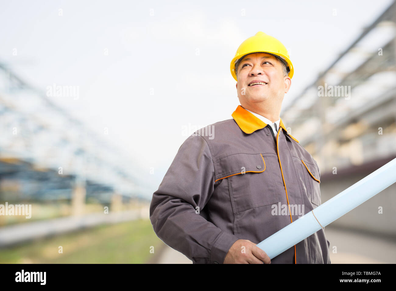 old chinese man engineer in oil refinery plant Stock Photo - Alamy