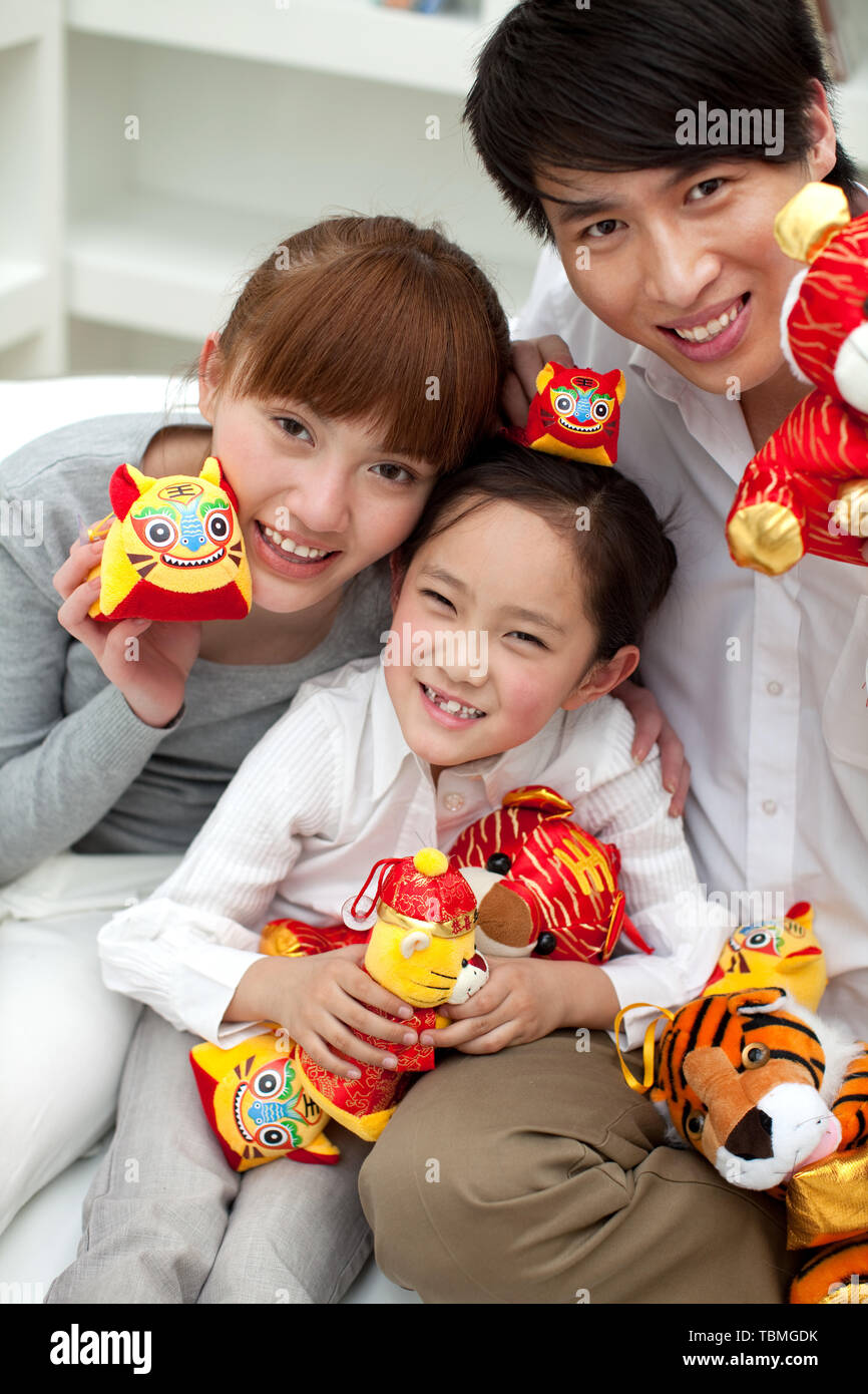 Happy life for a family of three Stock Photo - Alamy