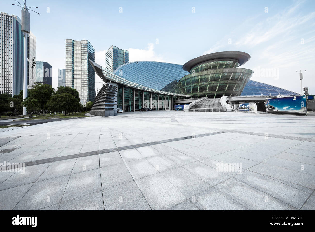 modern square and skyscrapers under sunbeam Stock Photo - Alamy