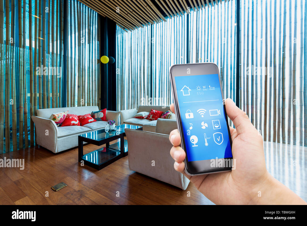 smart phone with smart home with modern lobby Stock Photo - Alamy