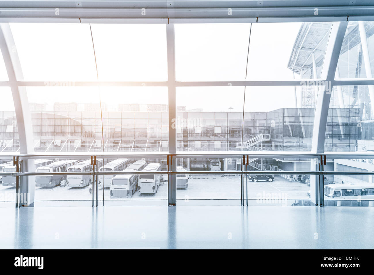 sunbeam, structure and buses through window Stock Photo - Alamy