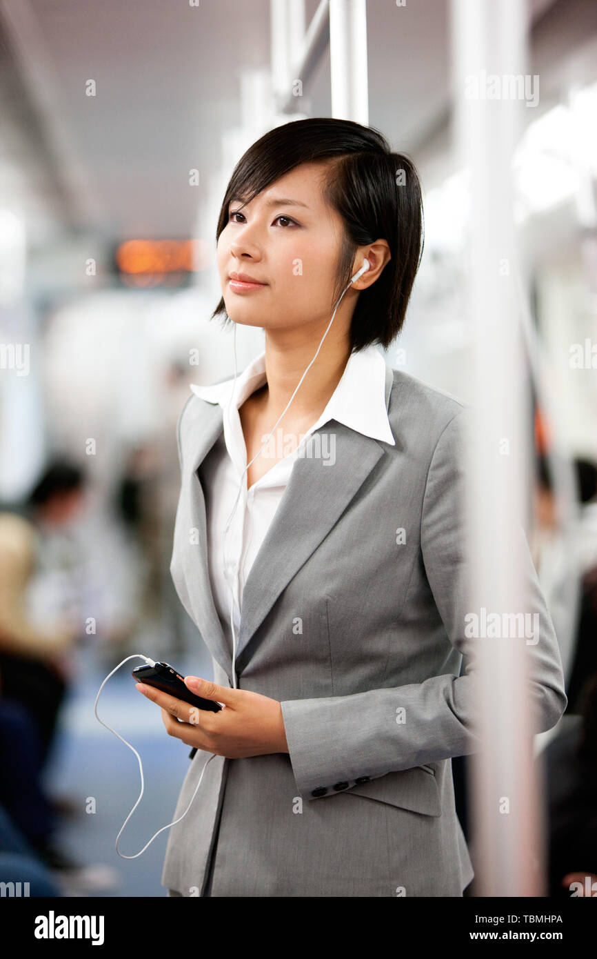 Business people take the subway on their commute to and from work Stock ...