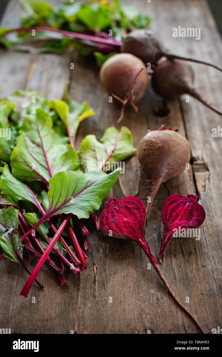 Fresh organic beet, beetroot on old rustic wooden background. Concept ...
