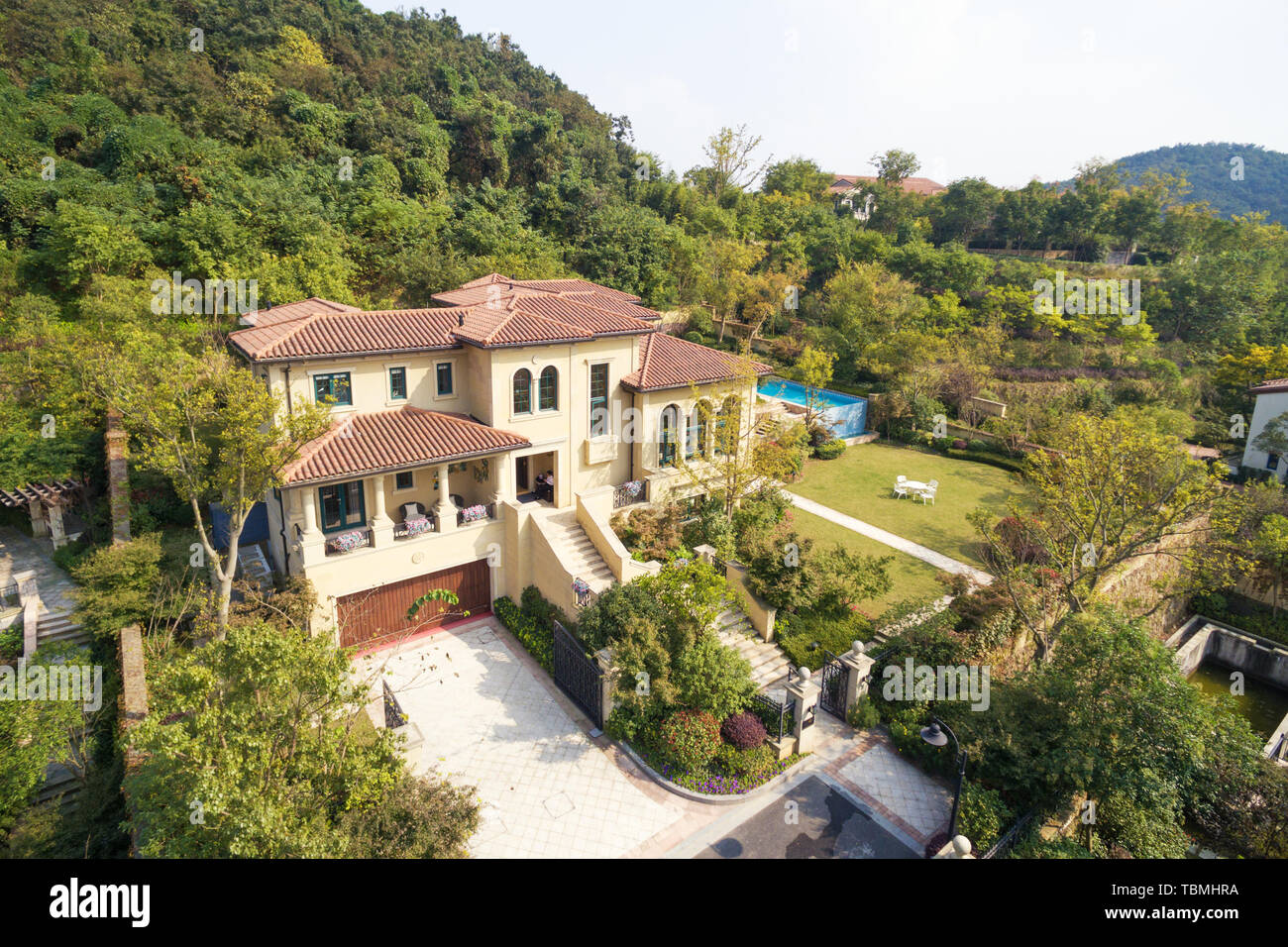 aerial view of modern villas at the foot of hill Stock Photo - Alamy