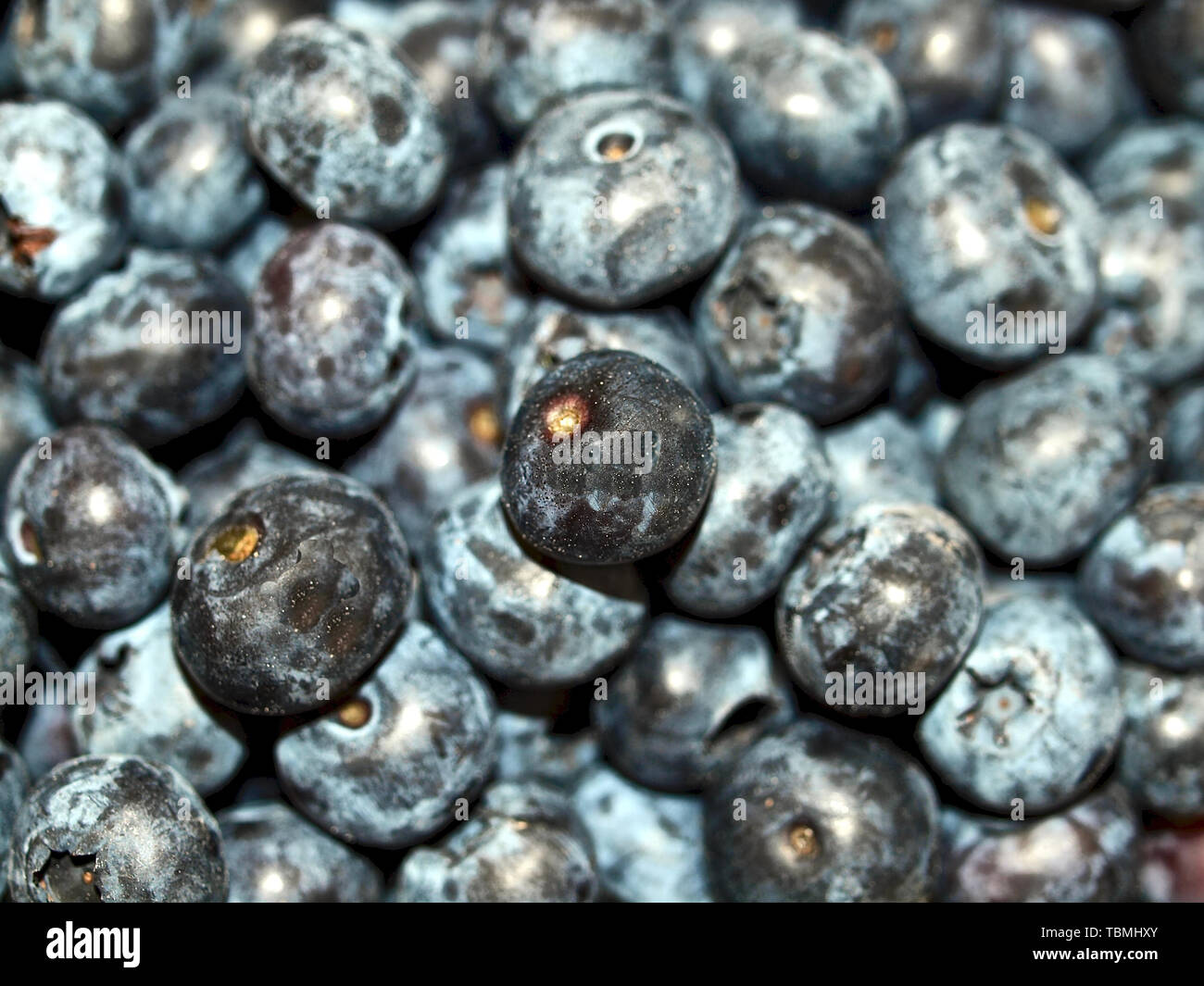 Blueberries on a pile at a food market Stock Photo - Alamy