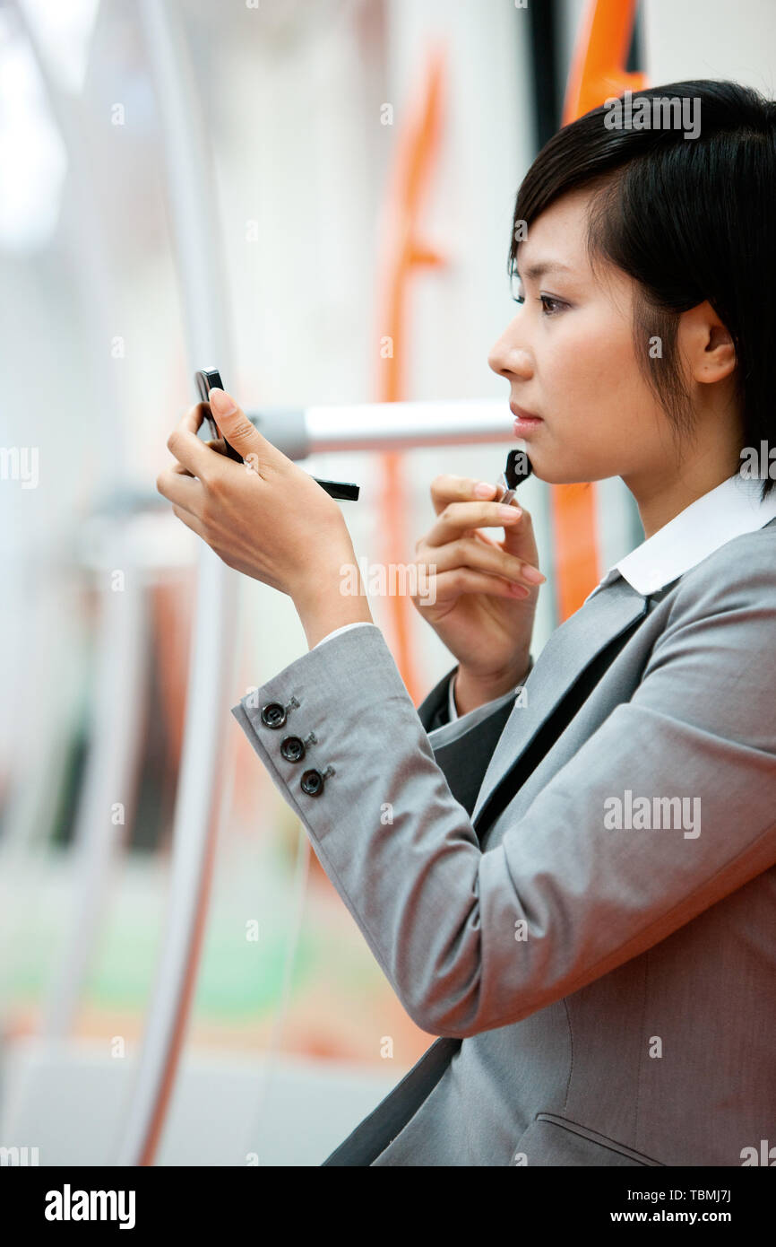 Business people take the subway on their commute to and from work Stock ...