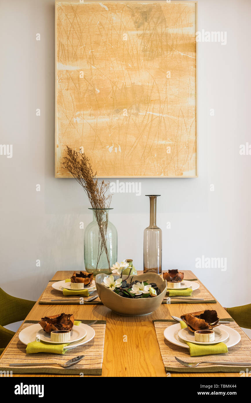 Dinner on table in dining room of villa Stock Photo - Alamy