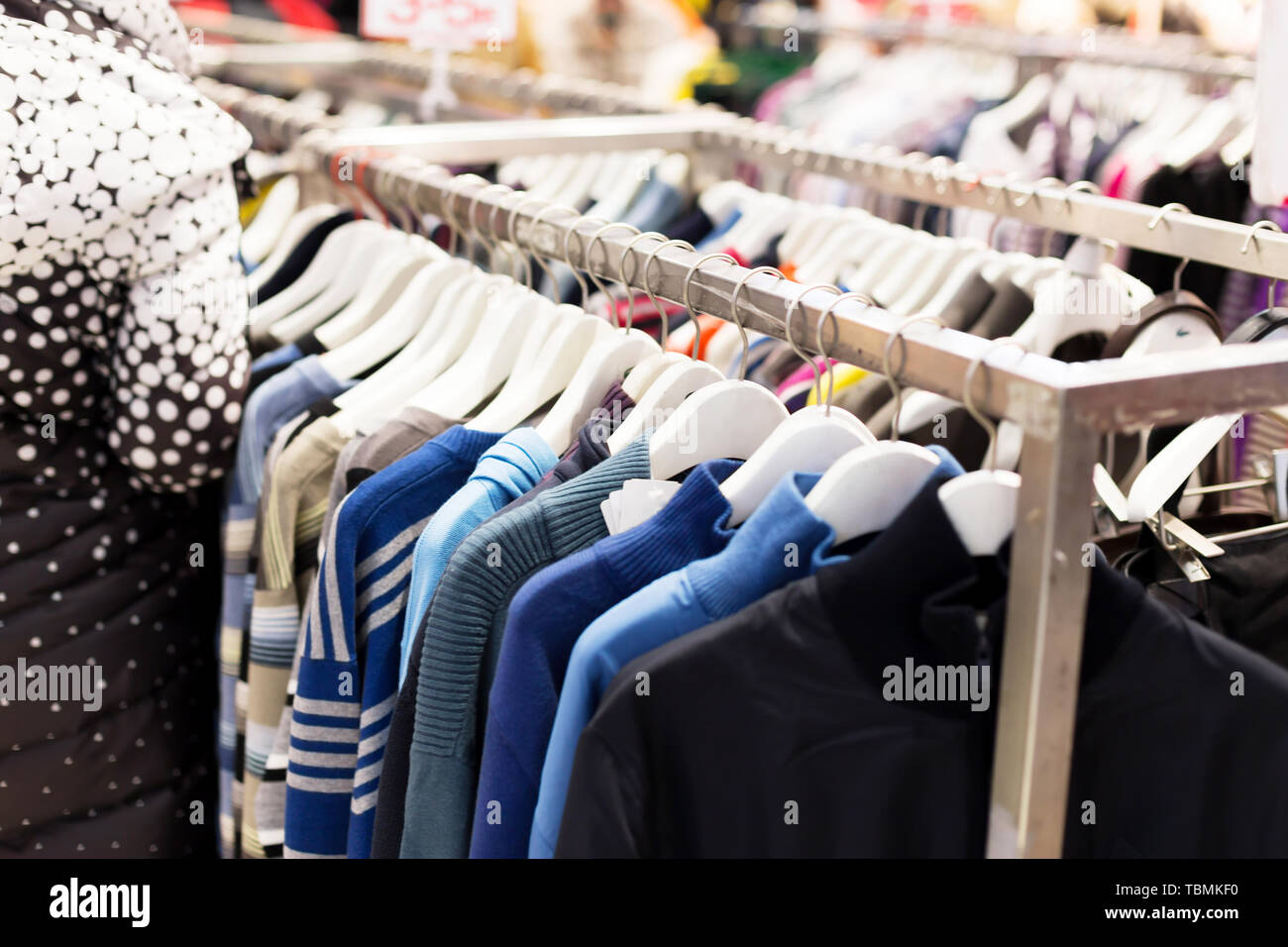 Fashion photography rack display Stock Photo - Alamy