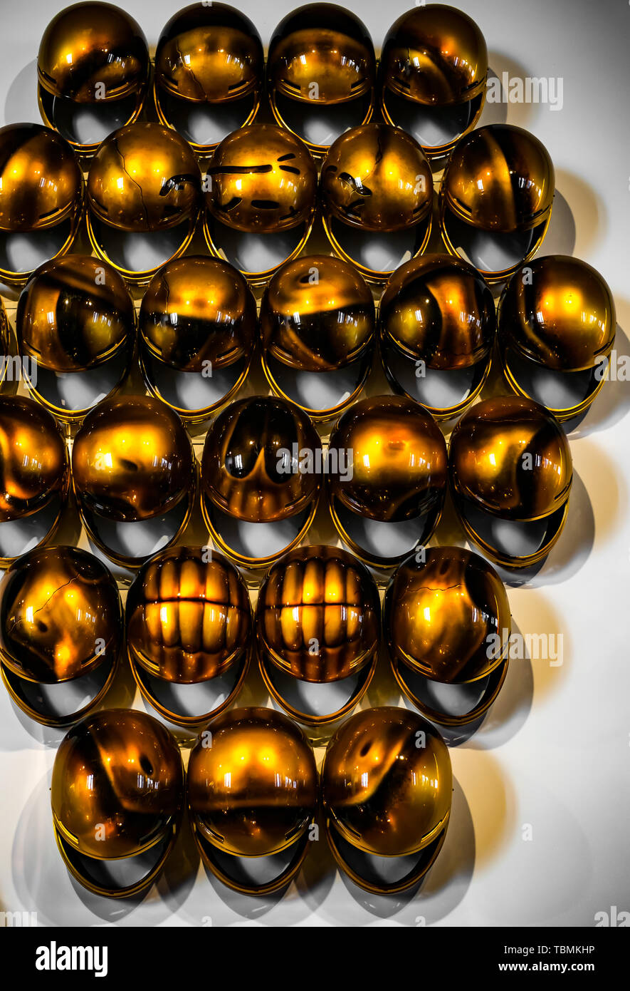abstract shiny golden motorcycle helmet Stock Photo - Alamy