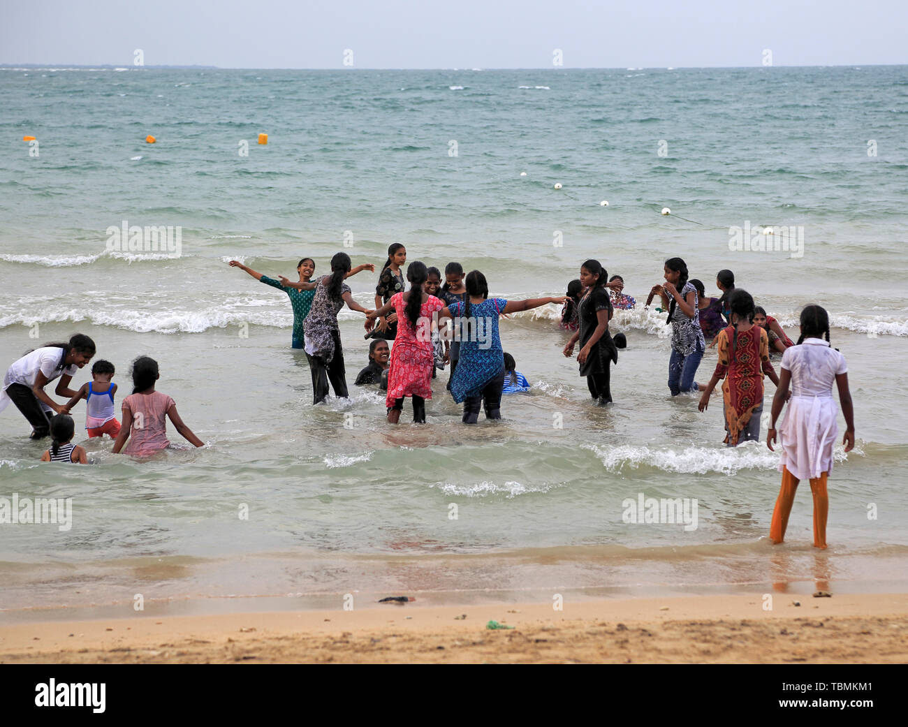 Bathing fully clothed hi-res stock photography and images - Alamy