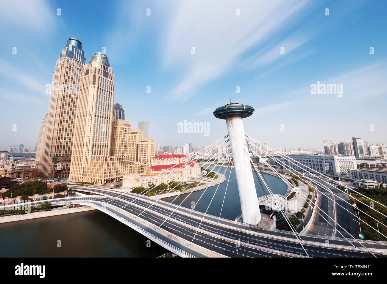 modern buildings near water in midtown of modern city Stock Photo - Alamy