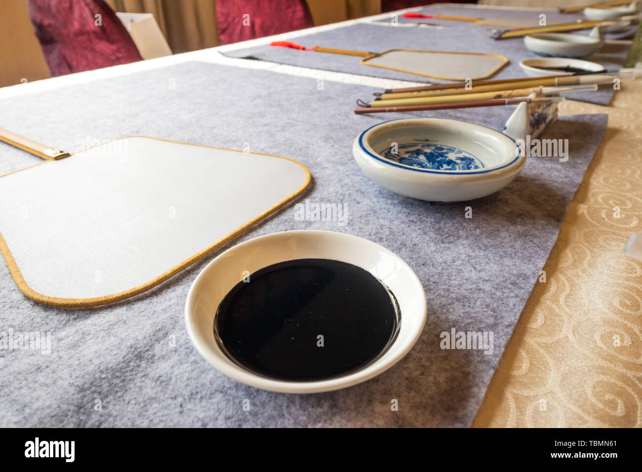Chinese calligraphy tools on table Stock Photo - Alamy