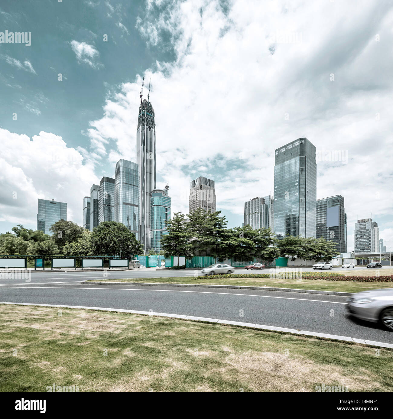 Modern city street and skyscrapers Stock Photo - Alamy