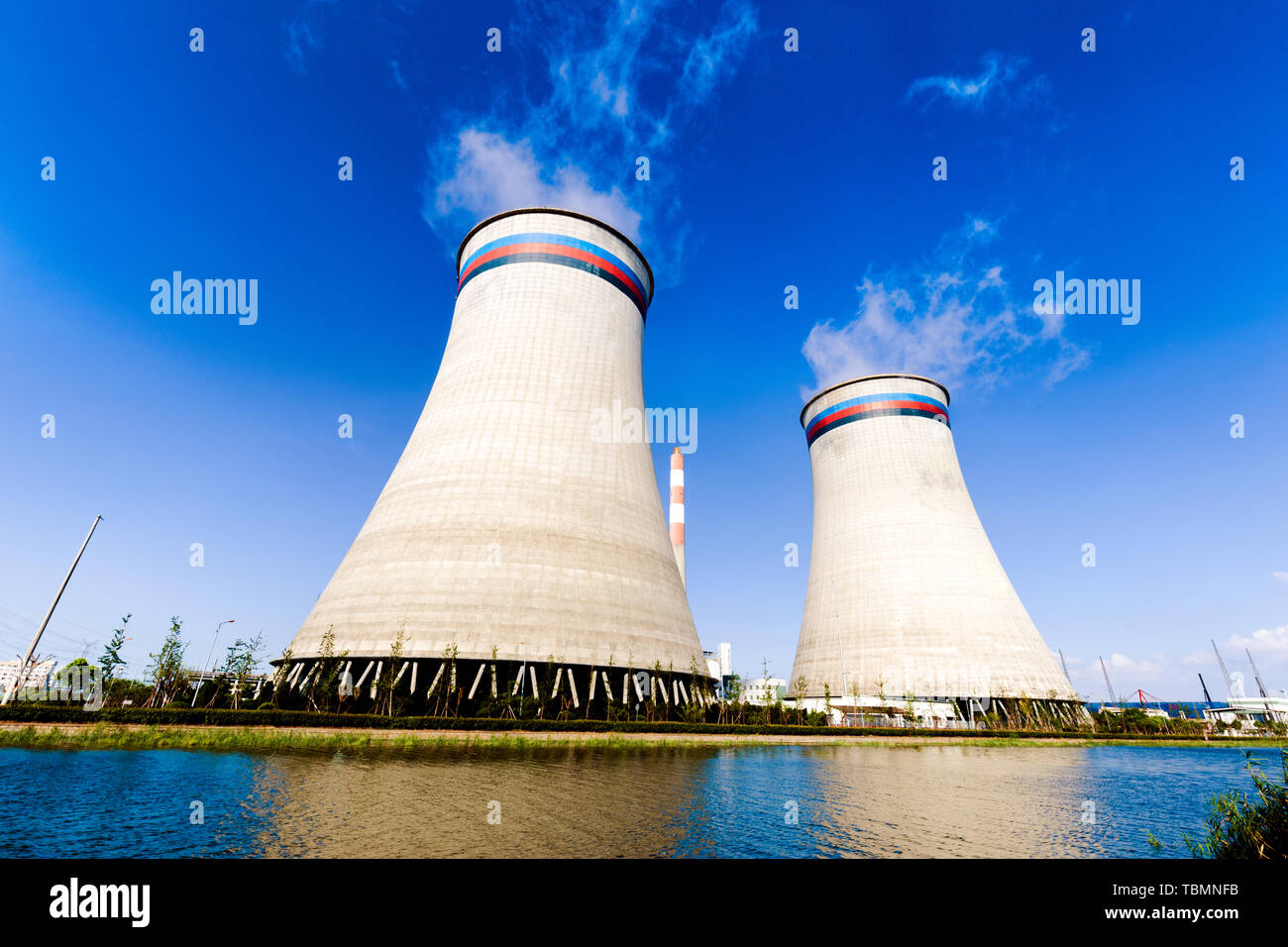 constructions inb modern power plant near river Stock Photo - Alamy