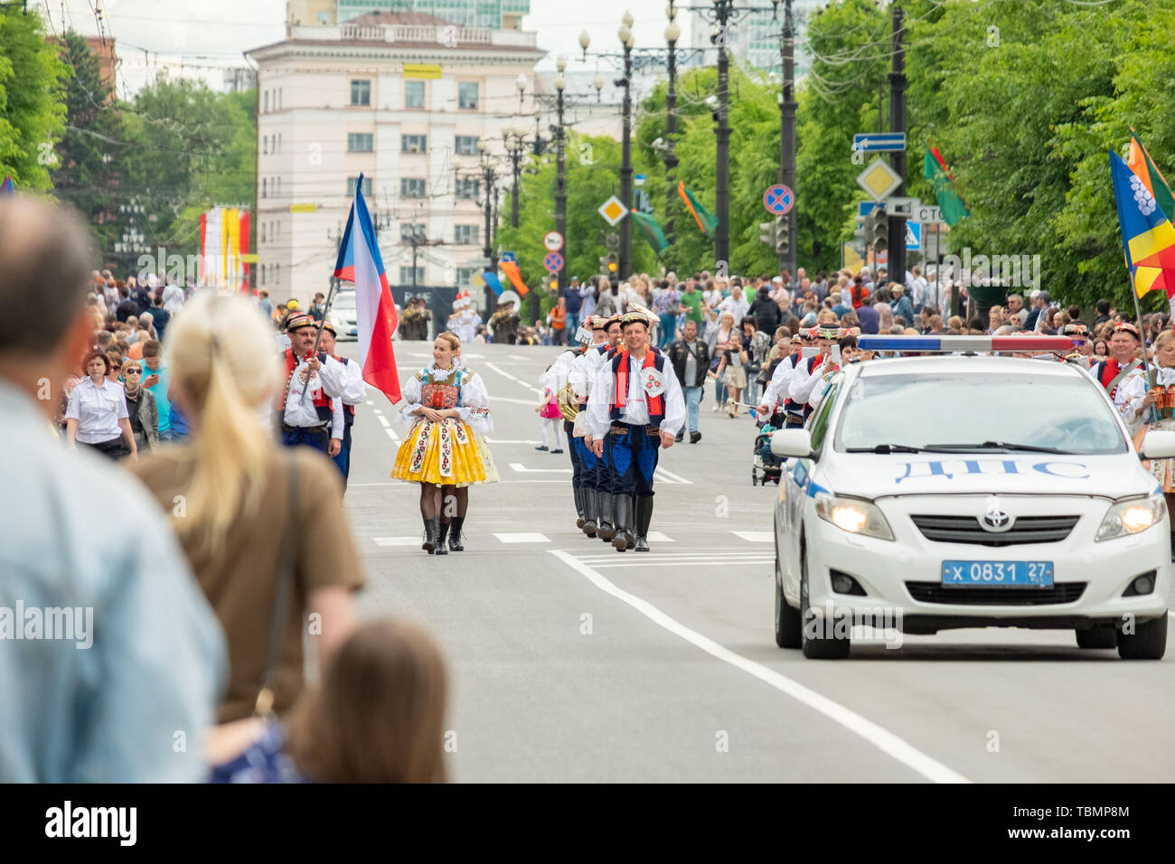 Military music bands marching through the empty streets of the city of ...