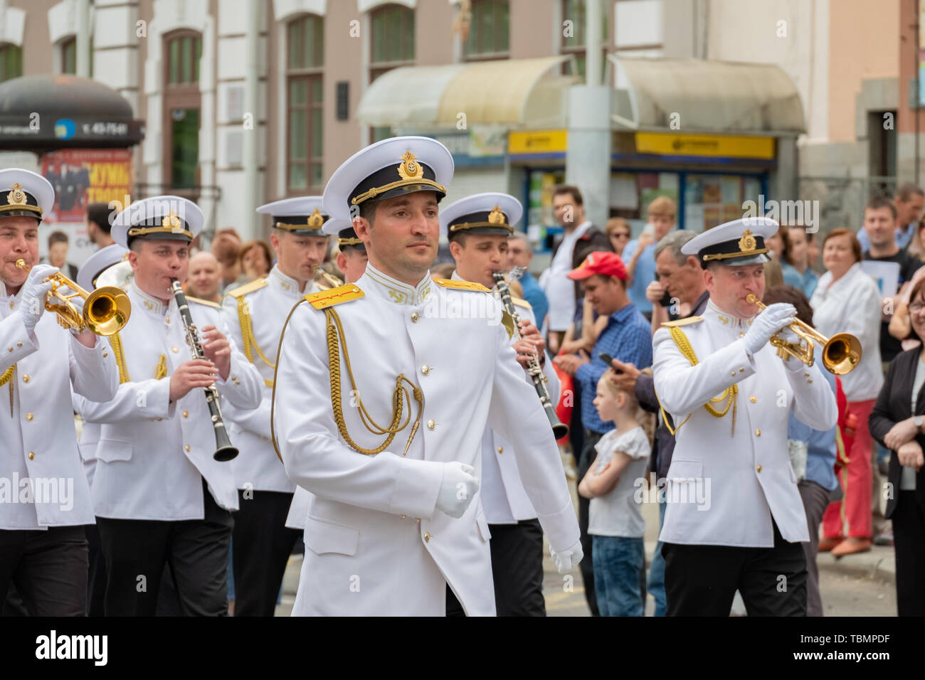 Military music bands marching through the empty streets of the city of ...