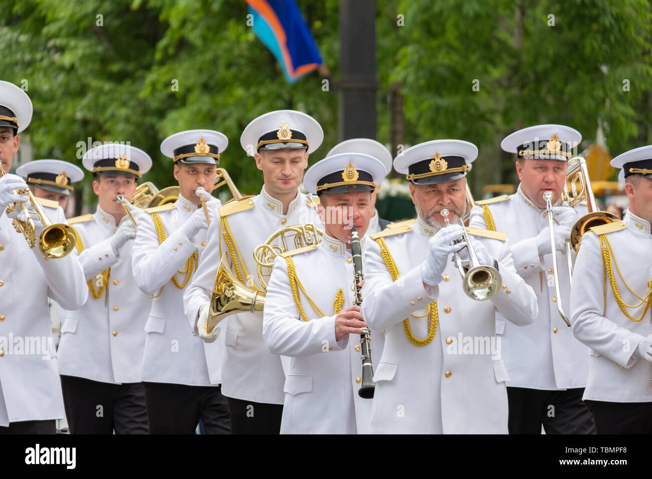 Military music bands marching through the empty streets of the city of ...