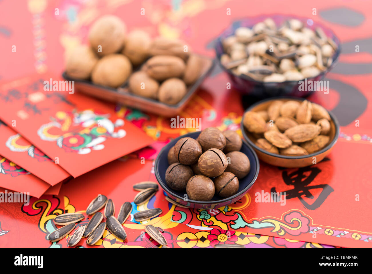 Nuts against the background of Spring Festival red couplets Stock Photo ...