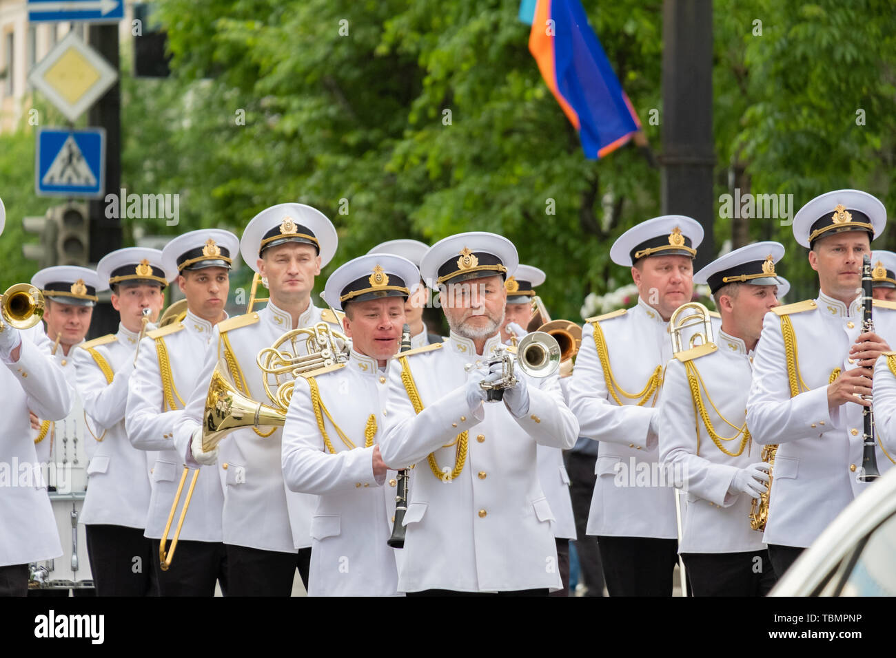 Military music bands marching through the empty streets of the city of ...