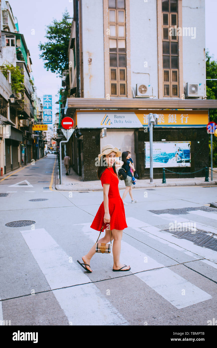 Red dress tour the big three buses Stock Photo - Alamy
