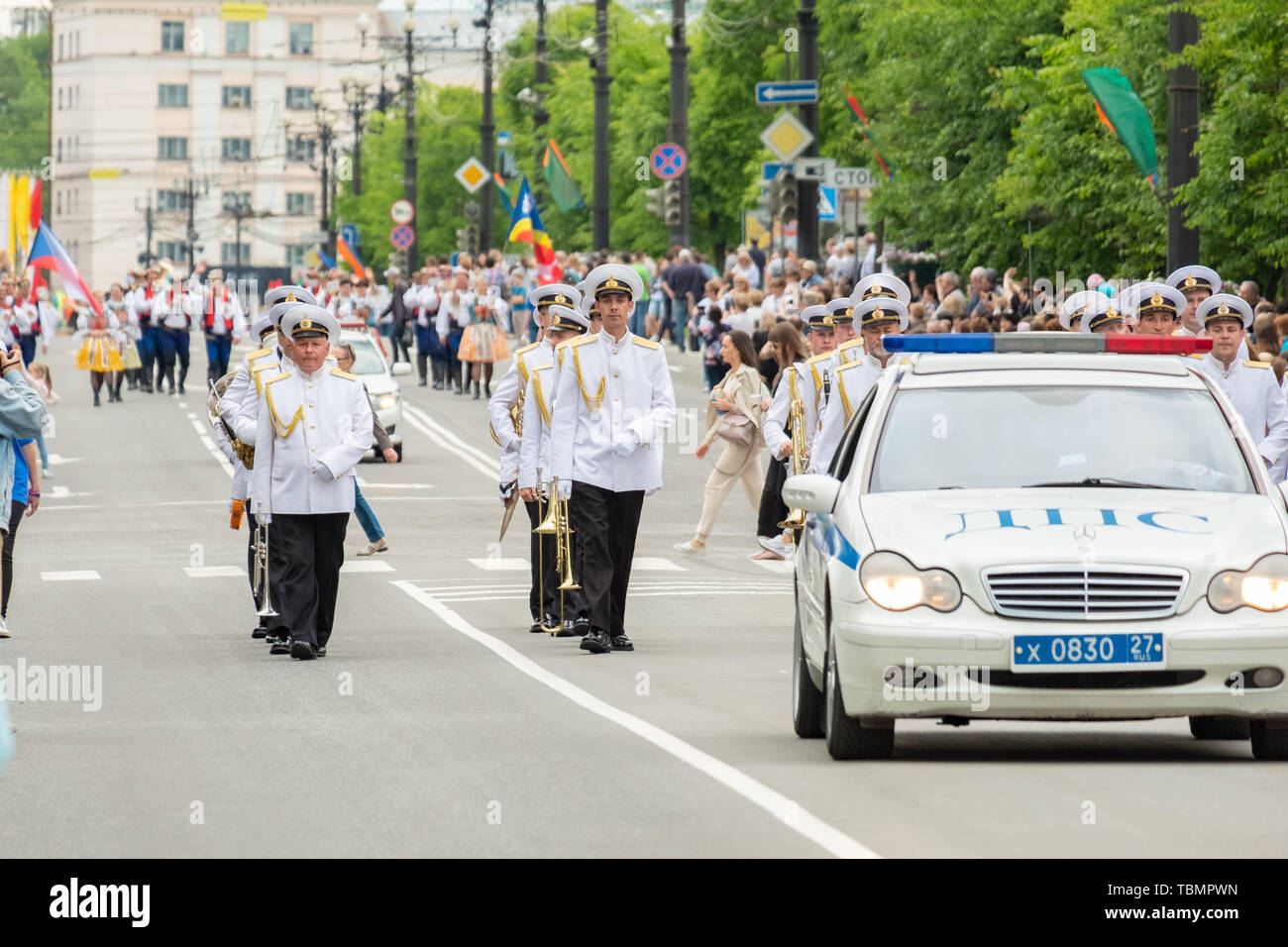Military music bands marching through the empty streets of the city of ...