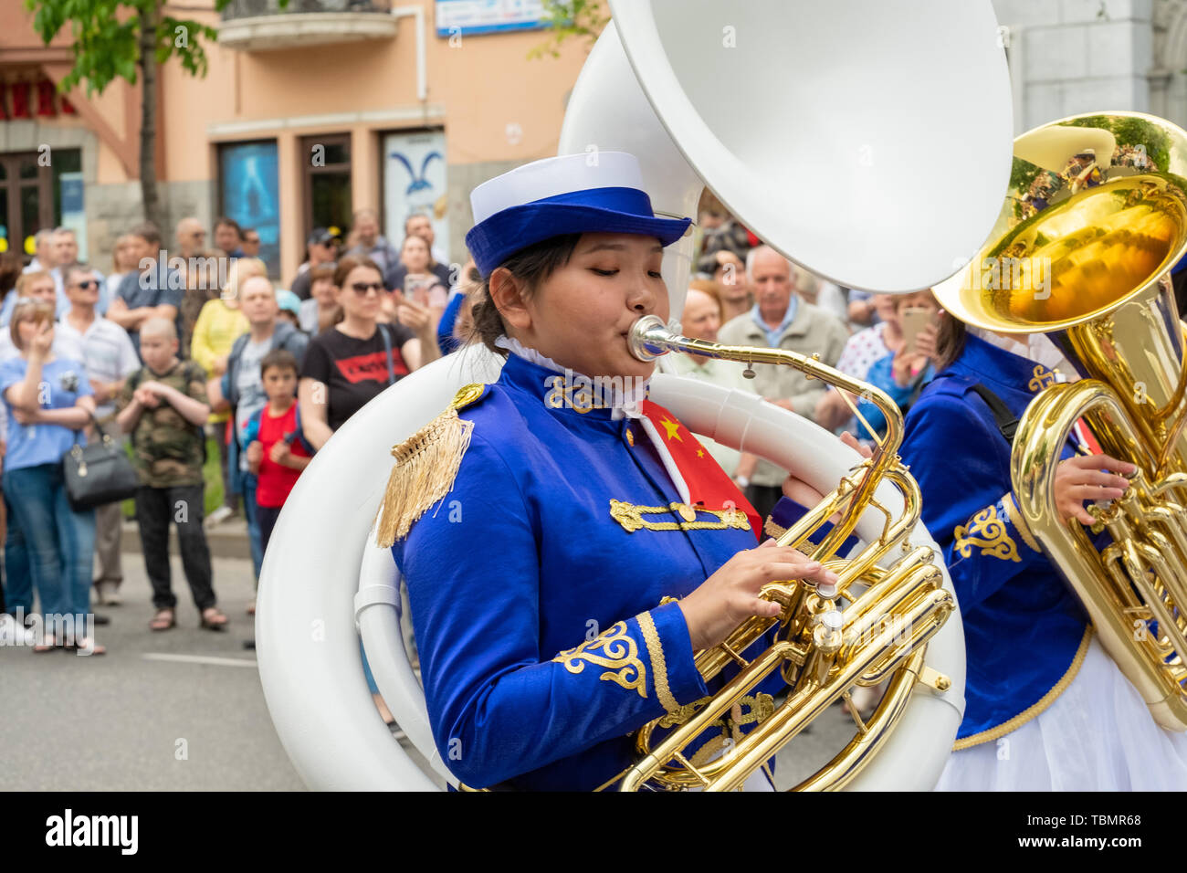 Military music bands marching through the empty streets of the city of ...