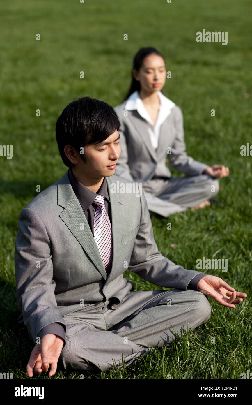 Business people practice yoga hi-res stock photography and images - Alamy
