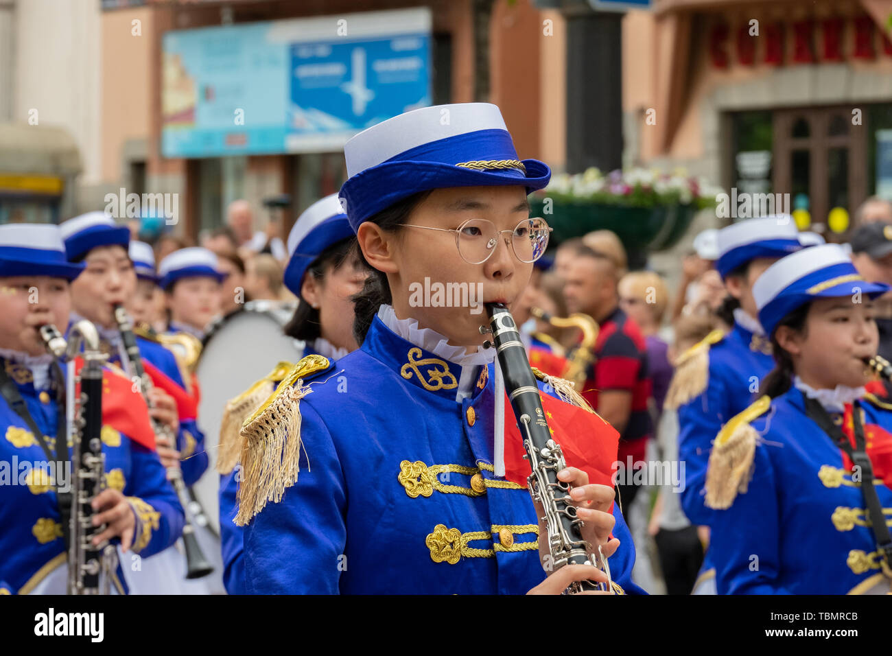 Military music bands marching through the empty streets of the city of ...