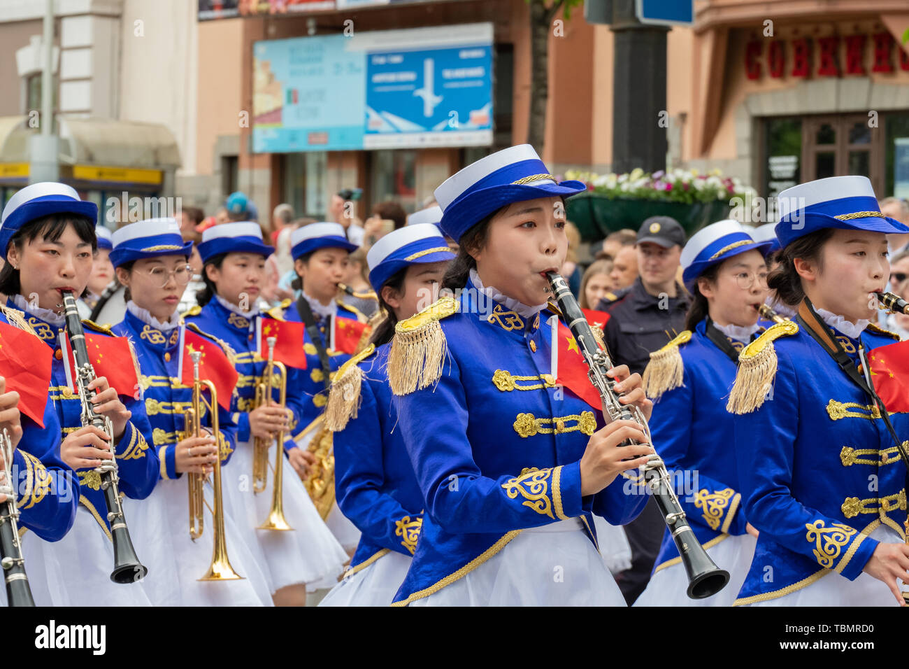 Military music bands marching through the empty streets of the city of ...