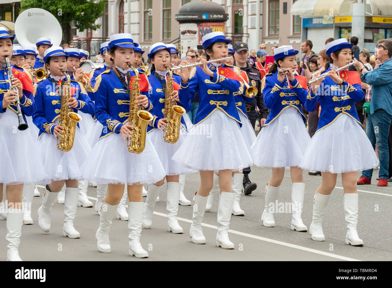Military music bands marching through the empty streets of the city of ...