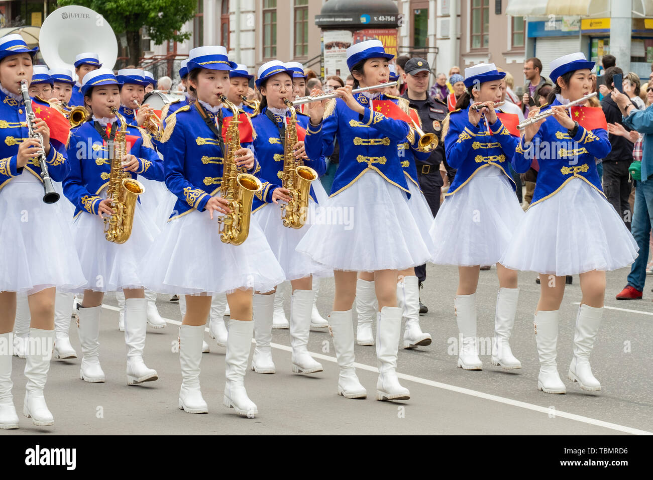 Military music bands marching through the empty streets of the city of ...
