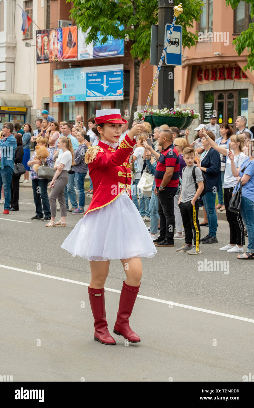 Military music bands marching through the empty streets of the city of ...