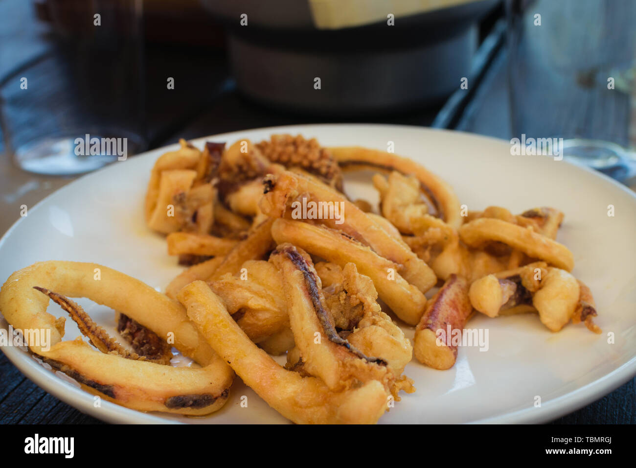 crispy fry of squid. Spanish traditional tapa Stock Photo - Alamy