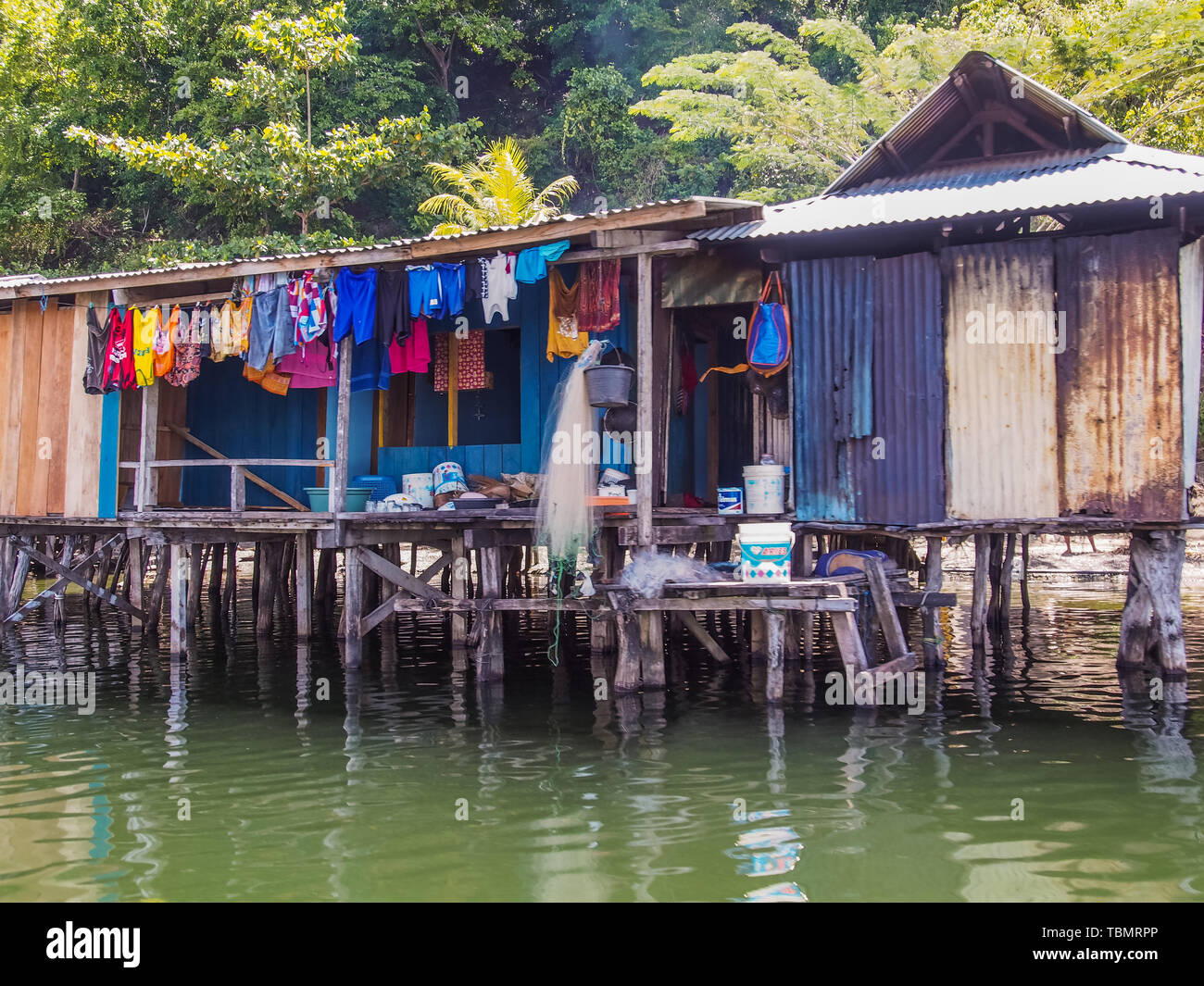 Jayapura, Indonesia - January 24, 2015: Stilt houses in Kampung Ayapo ...