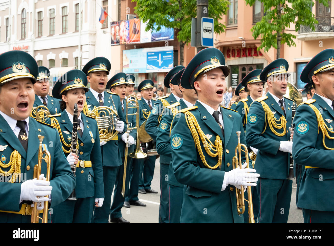 Military music bands marching through the empty streets of the city of ...