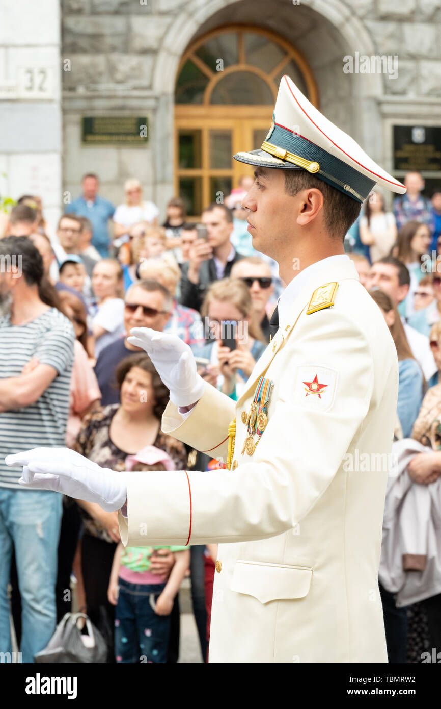 Military music bands marching through the empty streets of the city of ...