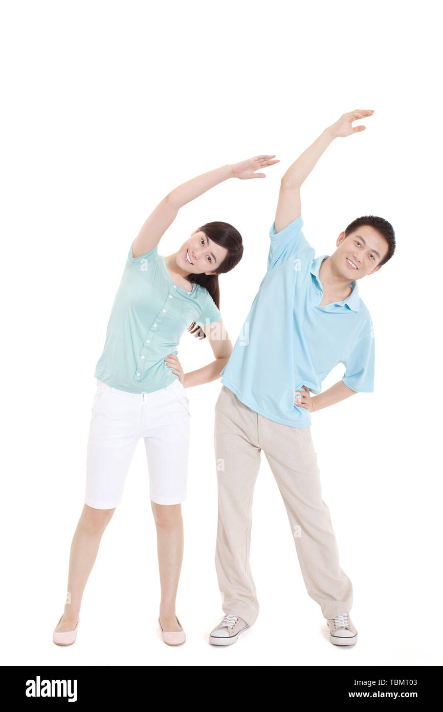 Old and young couple stretch hi-res stock photography and images - Alamy