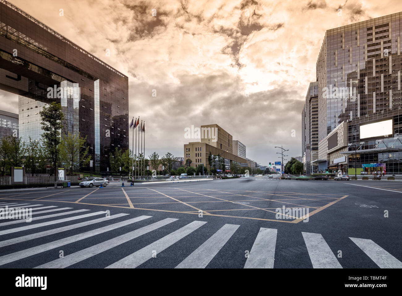 Empty urban roads and modern skyline Stock Photo - Alamy