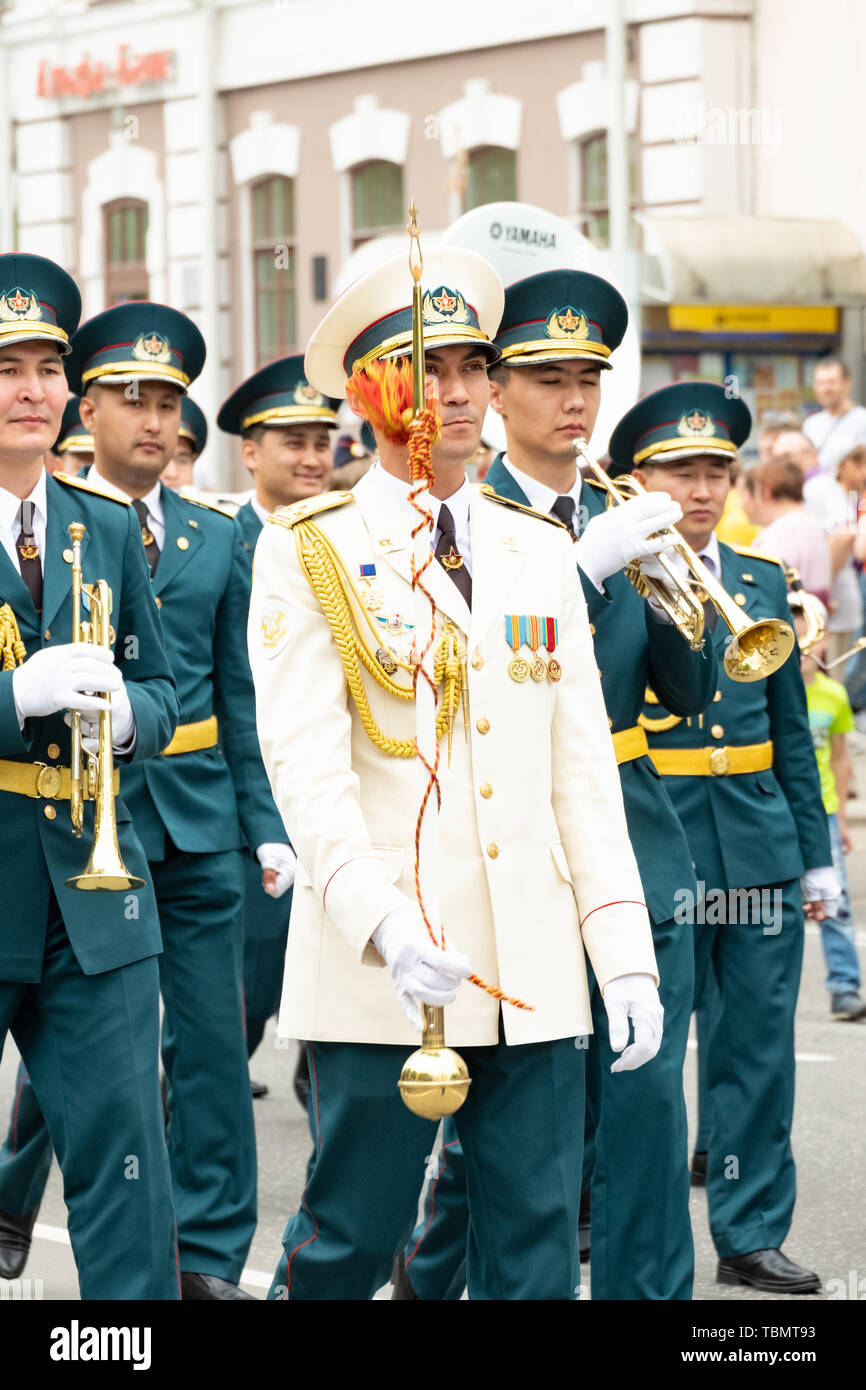 Military music bands marching through the empty streets of the city of ...
