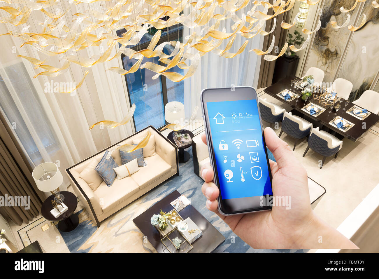 smart phone with smart home with modern living room Stock Photo - Alamy