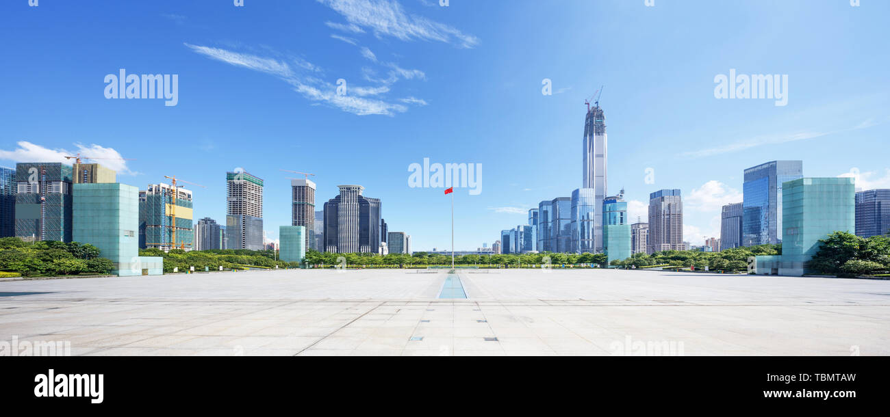 Modern square and skyscrapers Stock Photo - Alamy