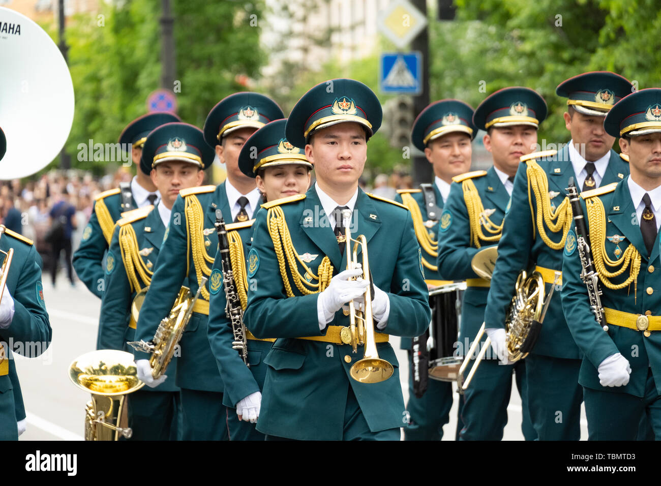 Military music bands marching through the empty streets of the city of ...