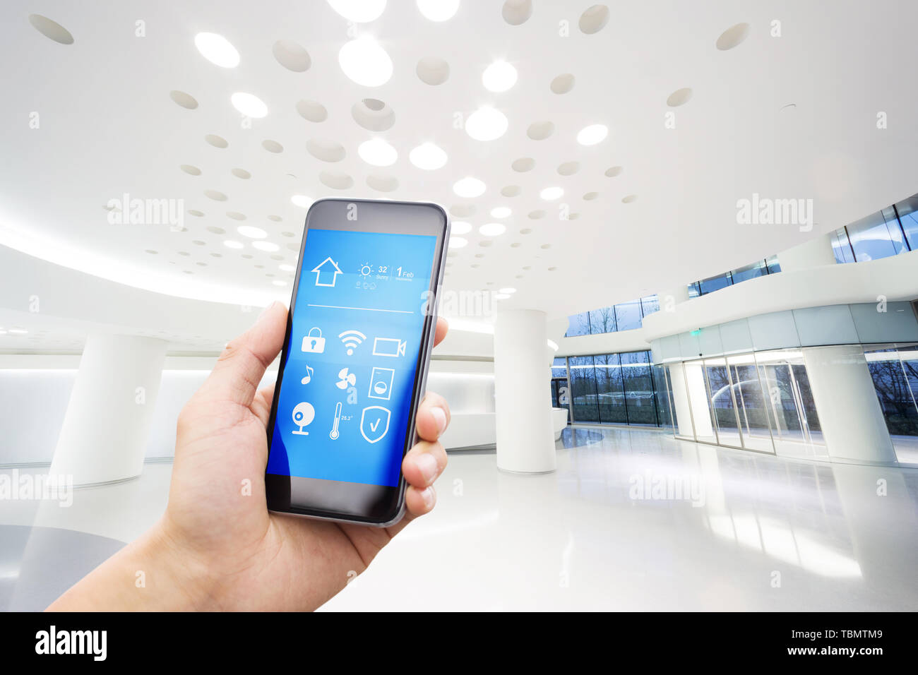 smart phone with smart home with modern hall Stock Photo - Alamy