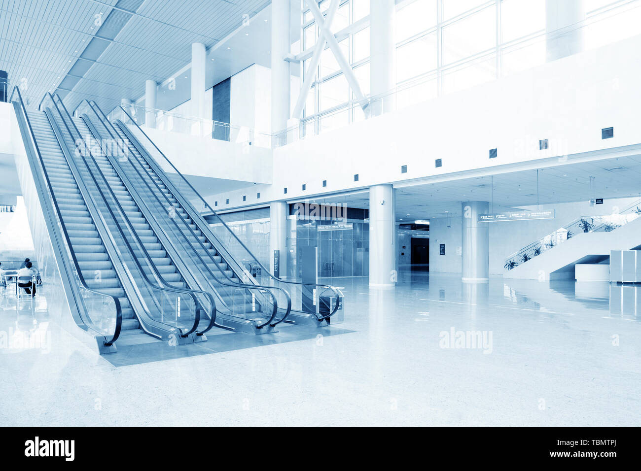 The translator in modern building hall Stock Photo - Alamy