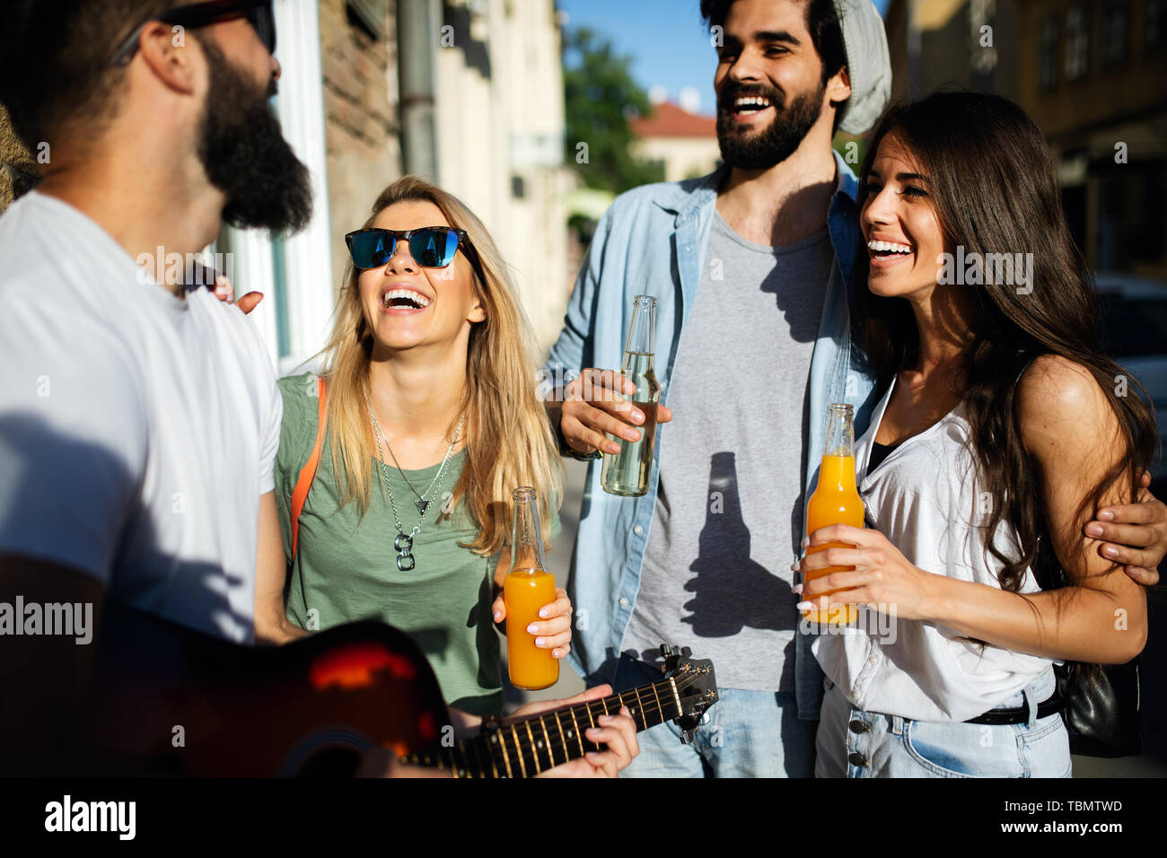 Group of young friends having fun together outdoor Stock Photo - Alamy